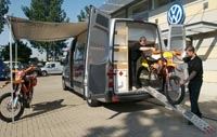 VW van turned into motorcycle race motorhome